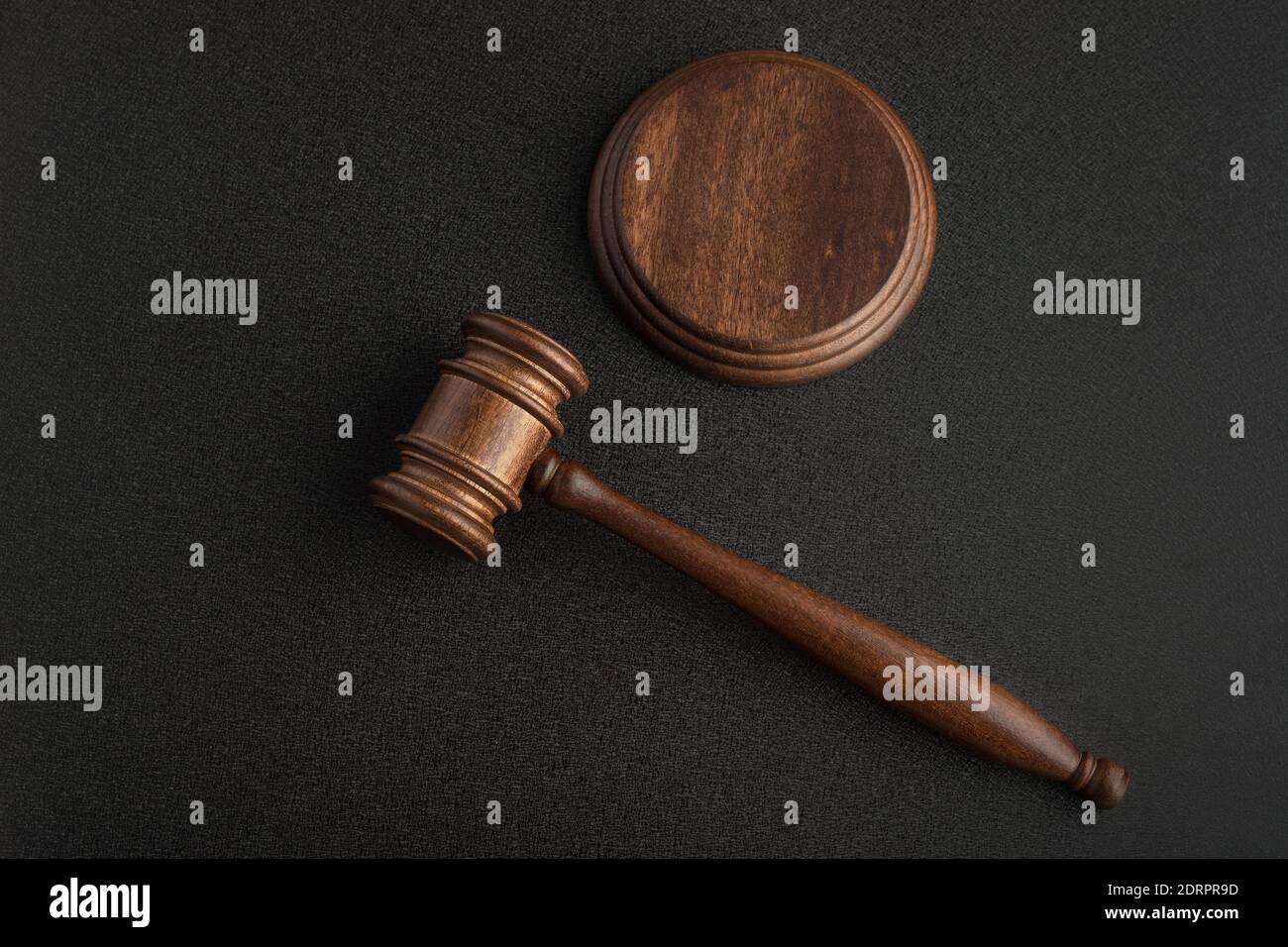 Wooden judge gavel and sound Board. Top view. Auction. Black background ...