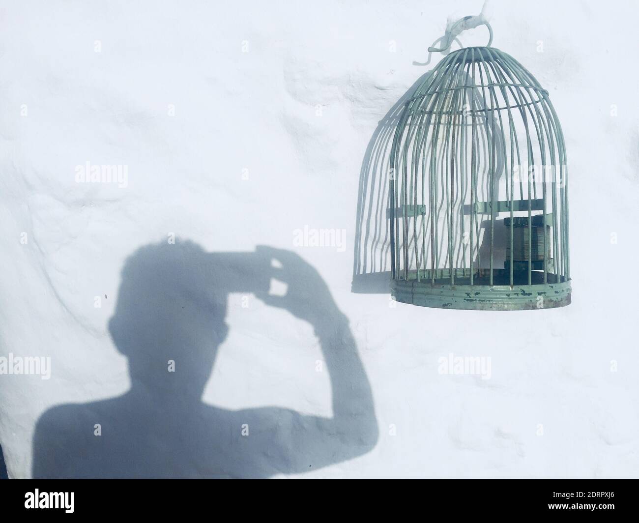 Person shadow and cage hi-res stock photography and images - Alamy