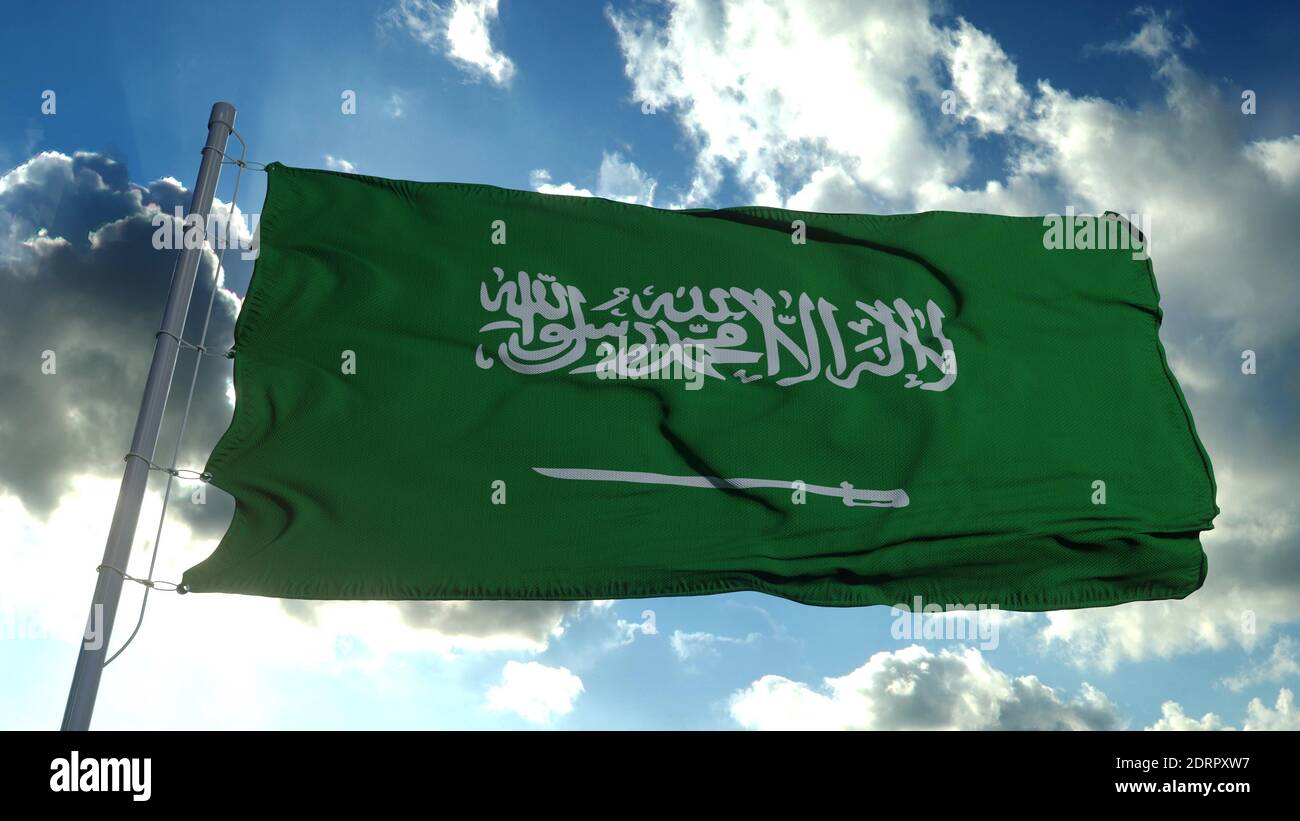 Saudi Arabia flag waving in the wind against deep blue sky. National ...