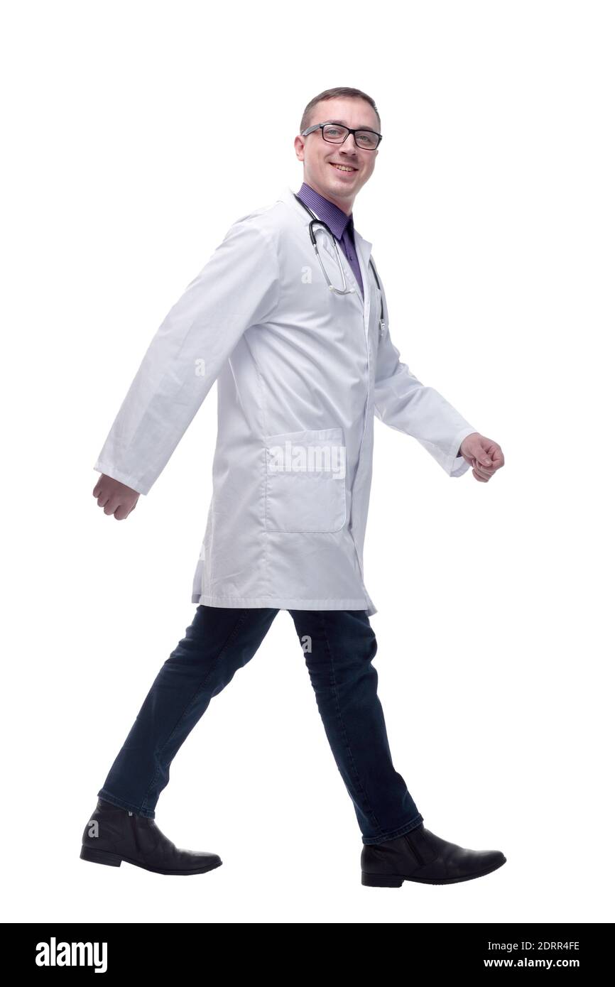 Male doctor walking isolated over a white background -side view Stock ...