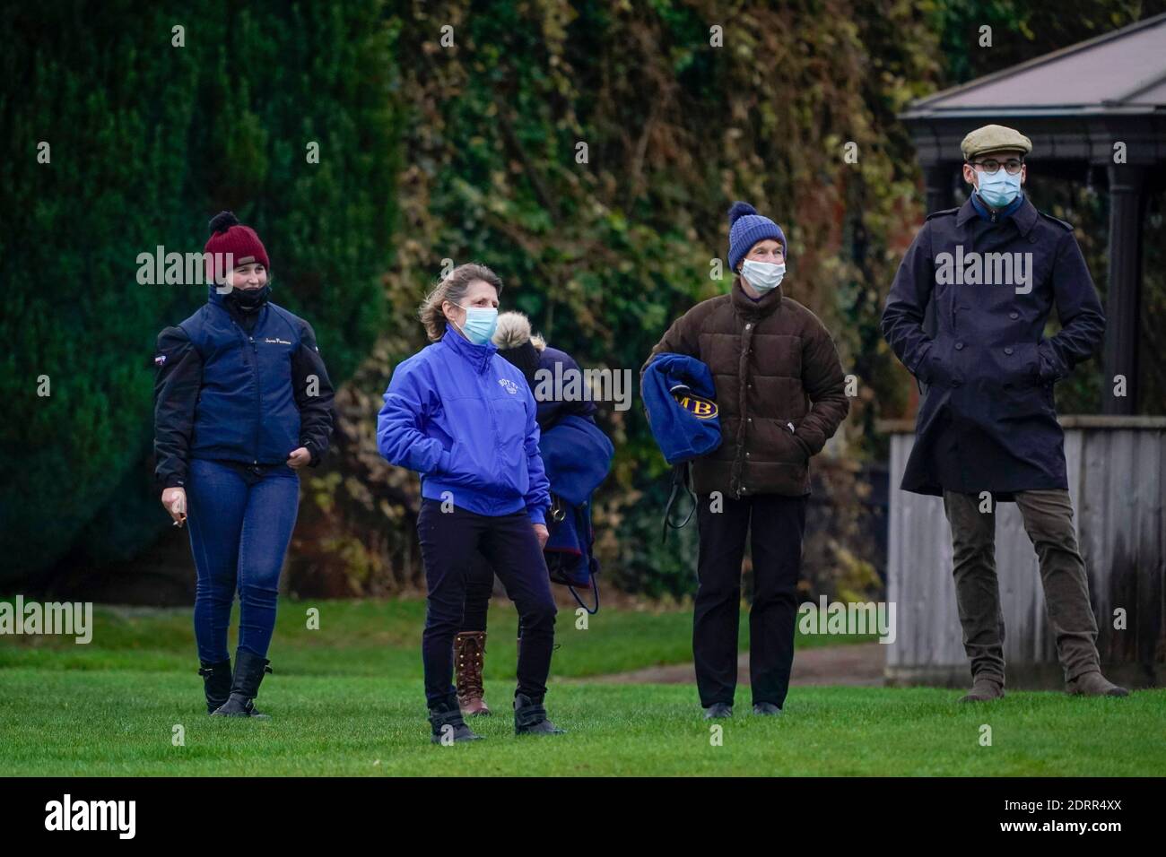 A general view as stable staff watch the racing at Lingfield Park ...