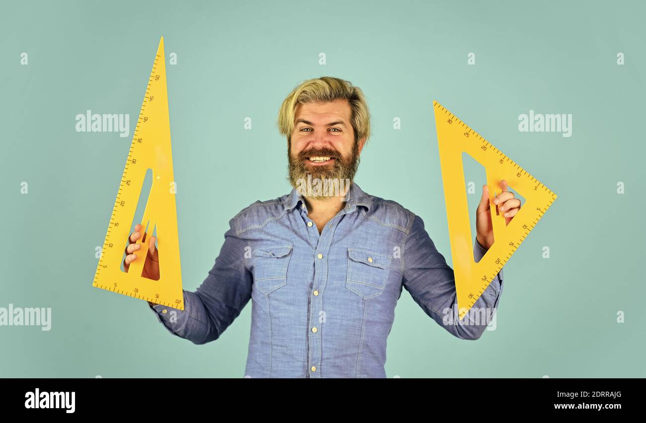 Teaching geometry. Bearded man teacher use ruler. Right angle ...