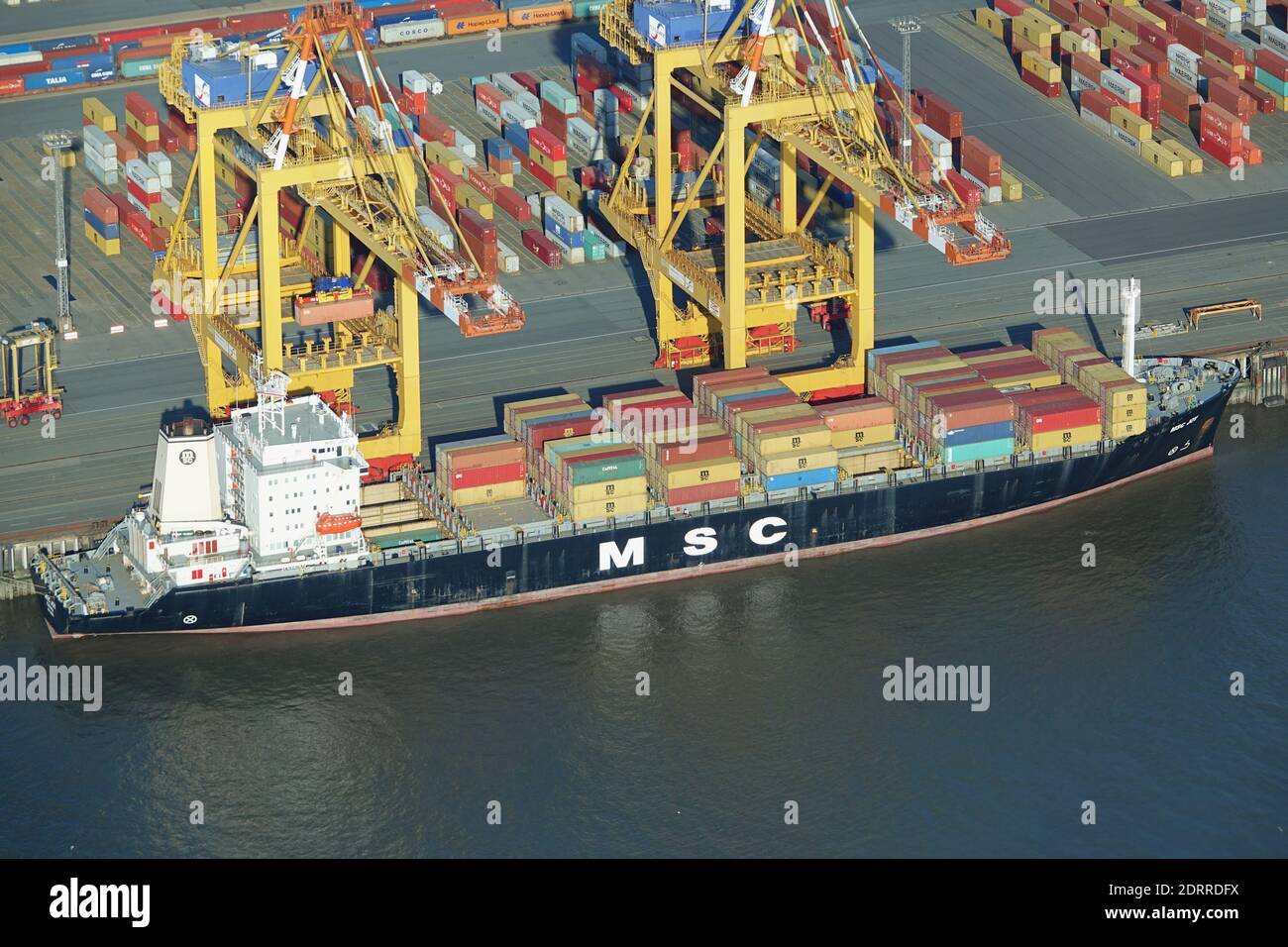 BREMERHAVEN, GERMANY - Aug 31, 2020: Aerial view of a container ship ...