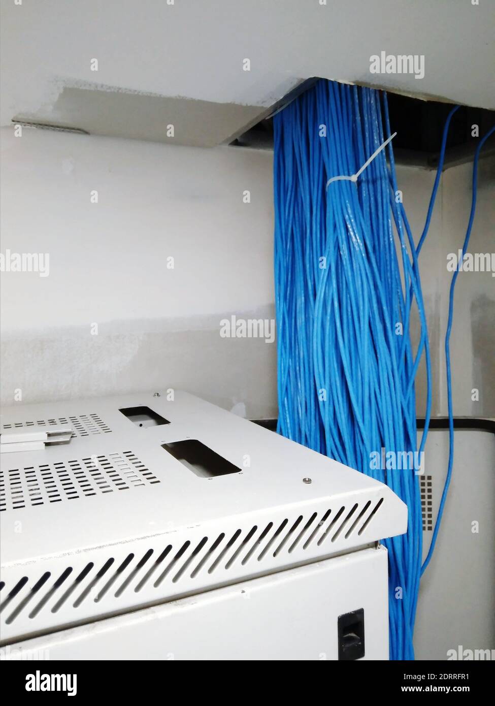 Cables Against Wall At Home Stock Photo - Alamy