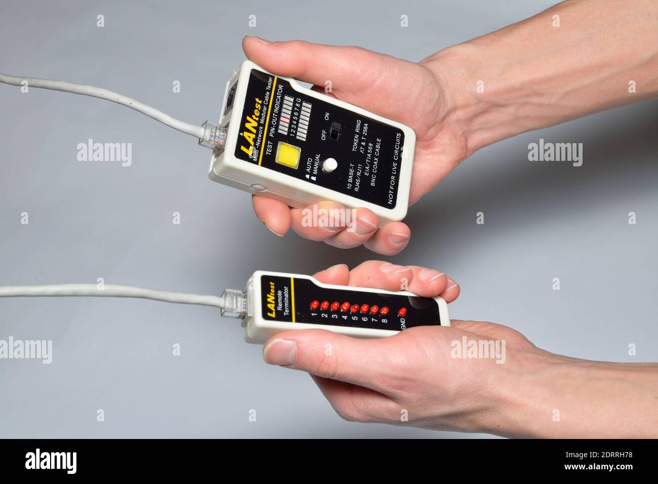 Hands of the installer Ethernet test LAN tester computer cable Stock ... Hands of the installer Ethernet test LAN tester computer cable Stock ...