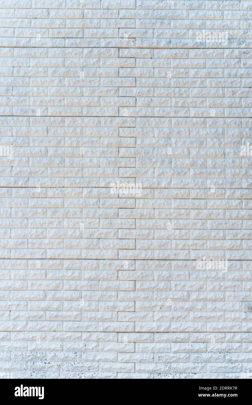 Abstract white brick wall. Textured background. Vertical frame Stock ...