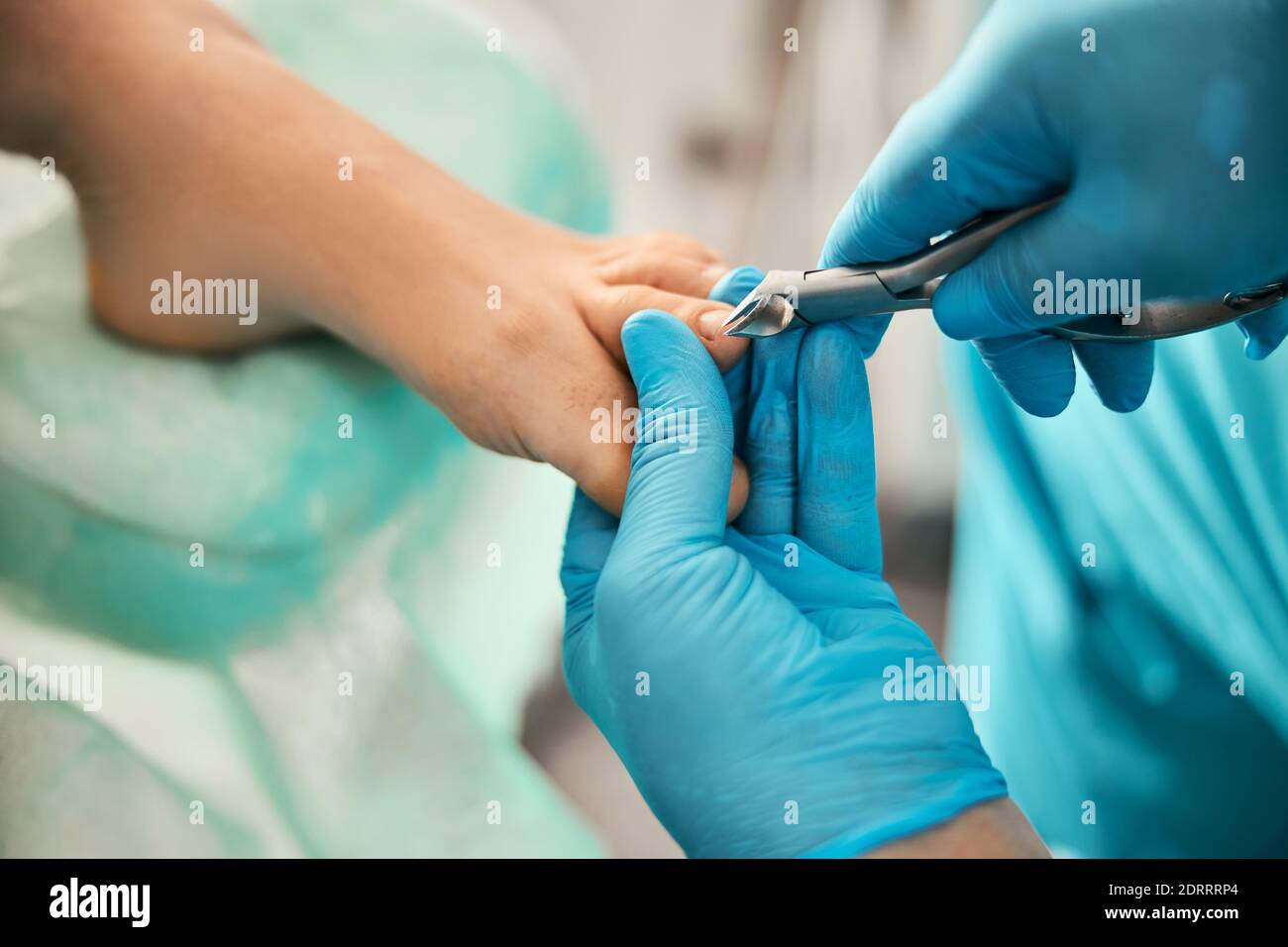 Professional chiropodist using sterile nail clippers instrument Stock ...