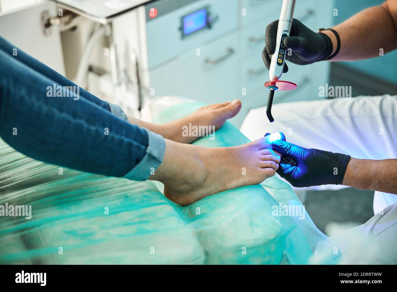 Focused photo on female feet leaning on support Stock Photo - Alamy