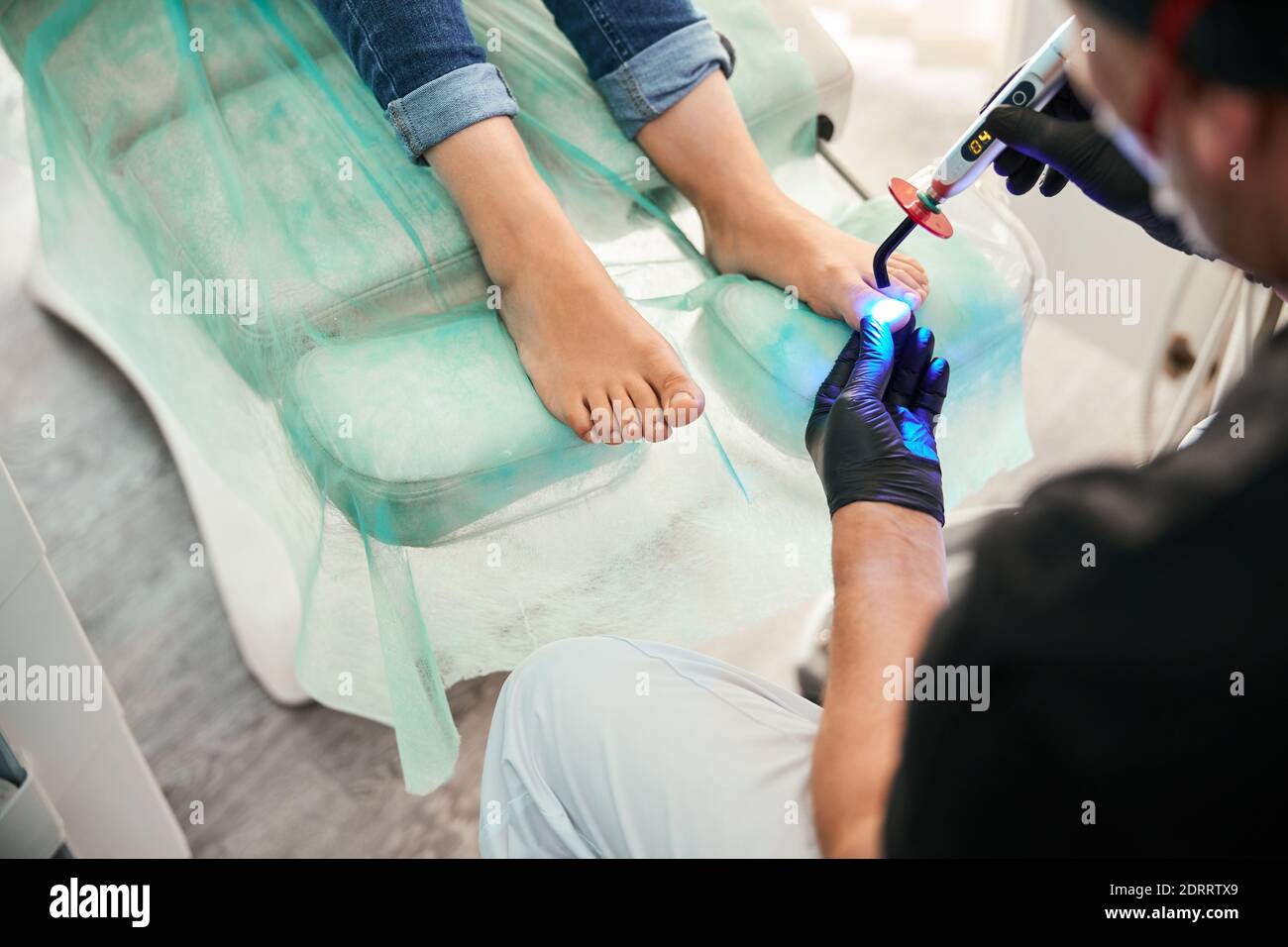 Young female person visiting professional podiatry clinic Stock Photo ...