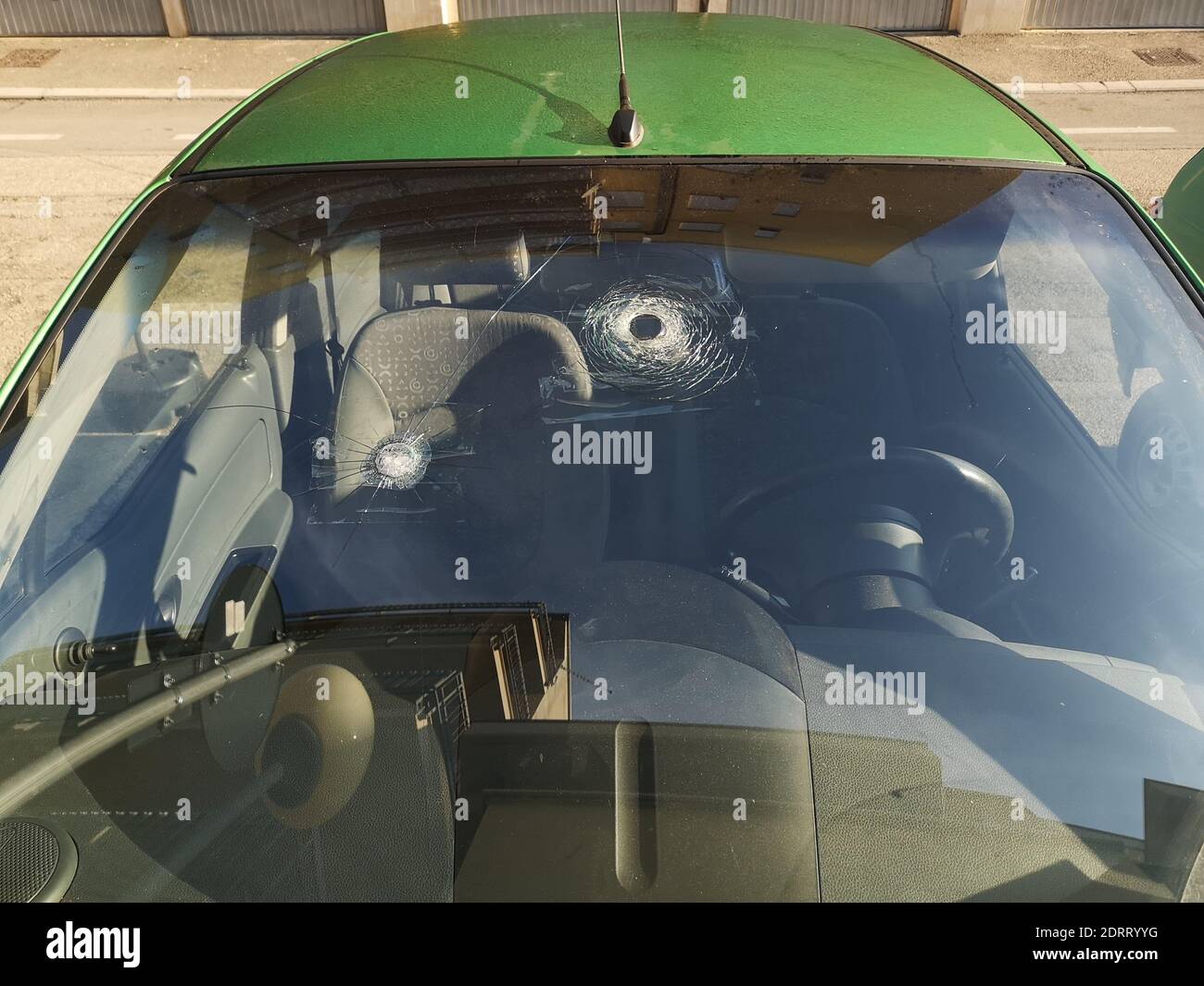 A view of a car's windshield damaged by hail Stock Photo - Alamy