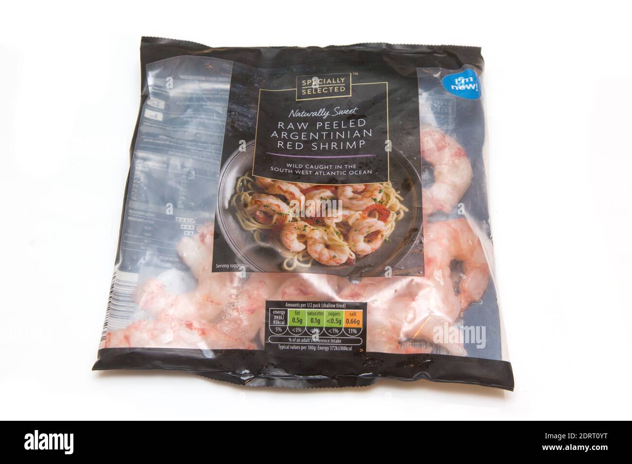 Packet of Argentinian raw peeled red shrimp isolated on a white studio ...