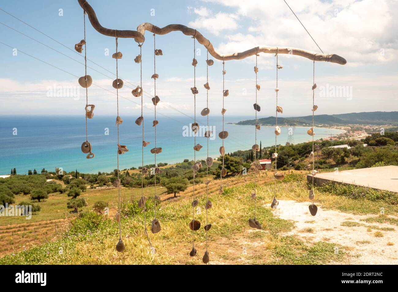 A stick decorated with seashells on the beach in Zakynthos, Greece ...