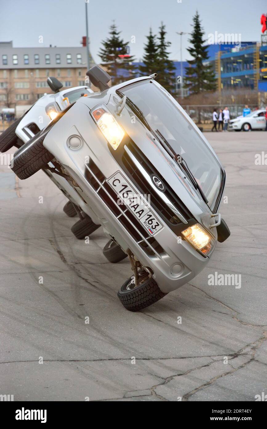 Car driving on two wheels hi-res stock photography and images - Alamy