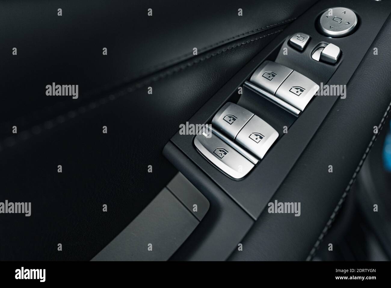 Window lifter button in a luxury car Stock Photo - Alamy
