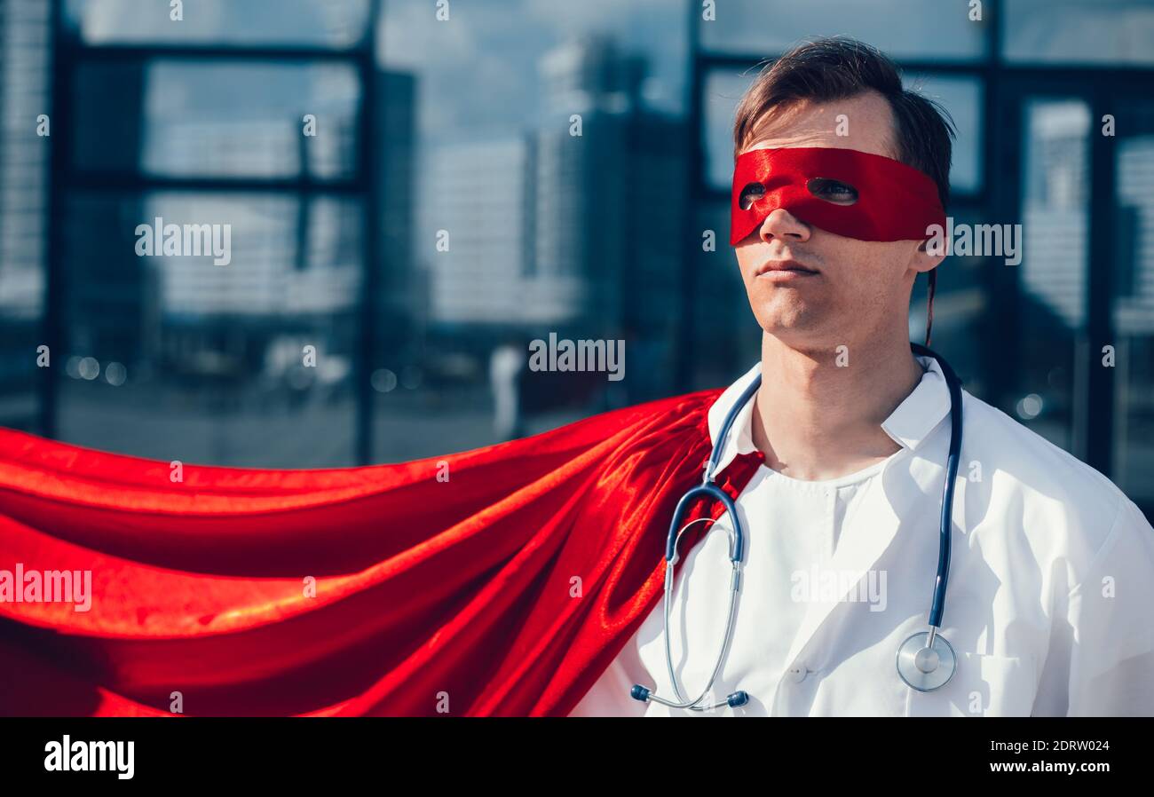 doctor hero in a Superman Cape standing on a city street Stock Photo ...