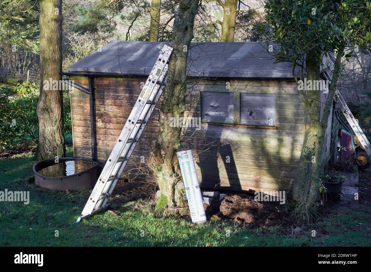 Maintenance on the roof of the smallholding water treatment shed ...