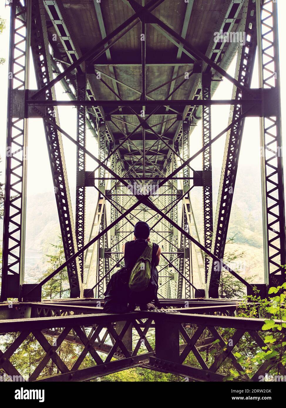 Man sitting under bridge hi-res stock photography and images - Alamy