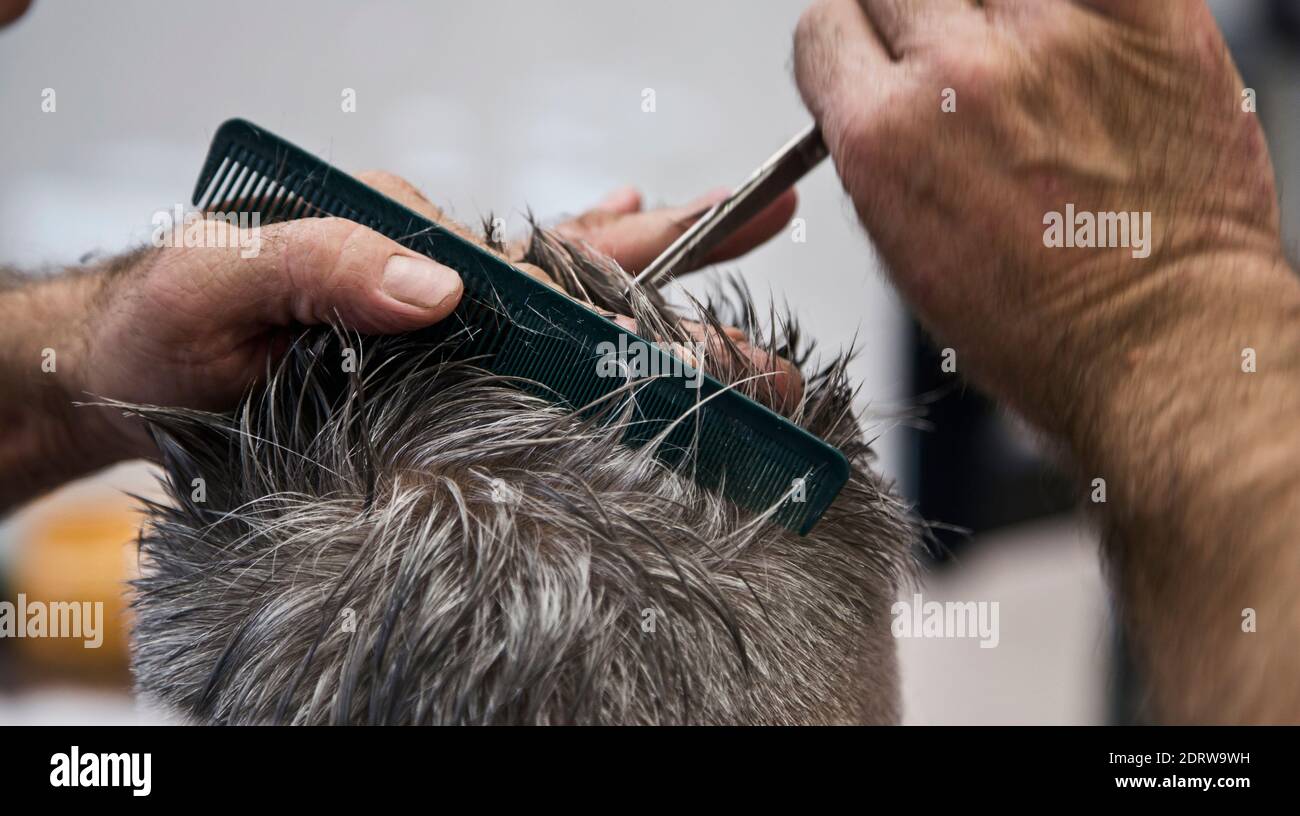 cut hair at a barber with scissors Stock Photo - Alamy