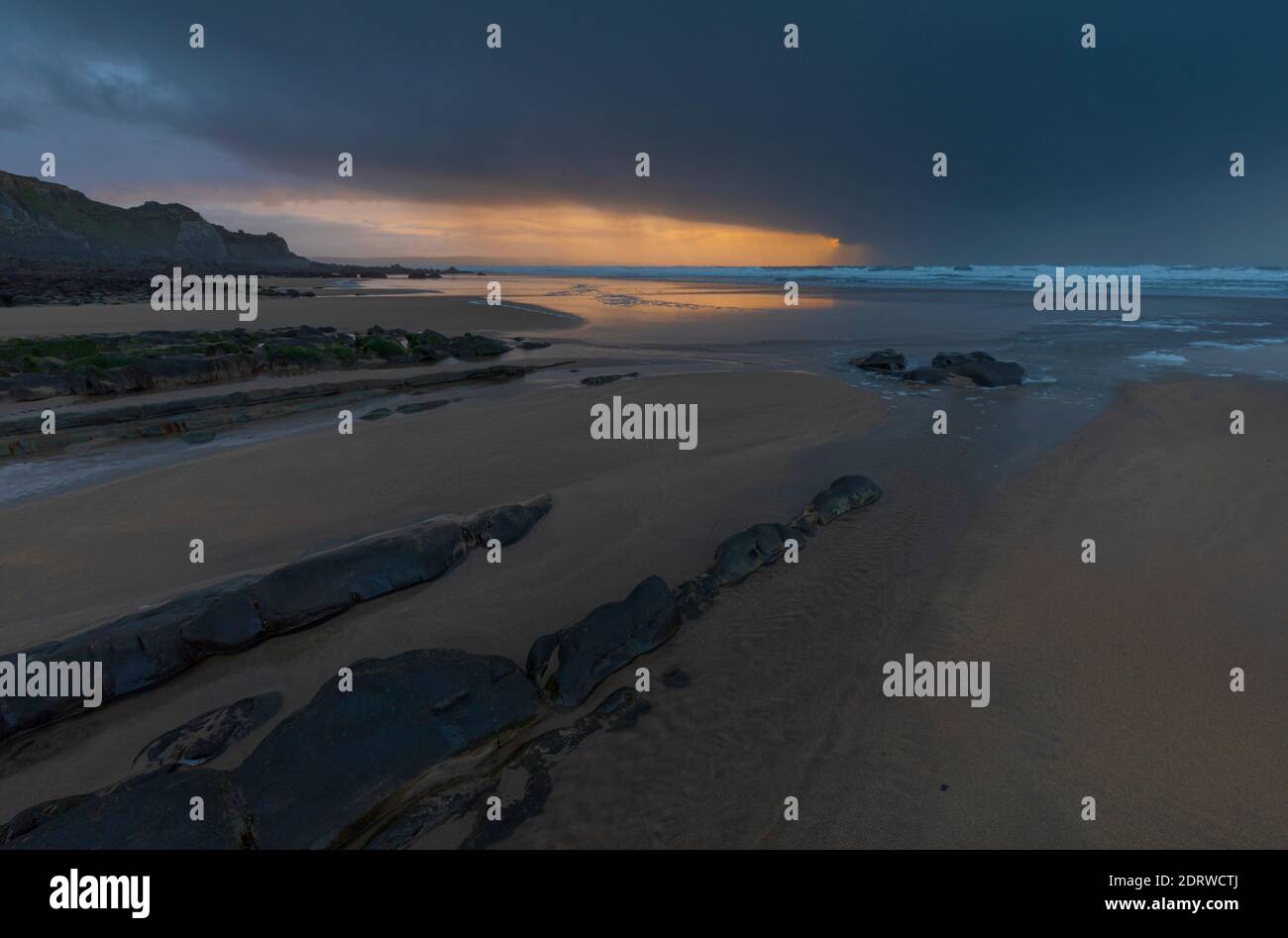 Sunset over Sandymouth Bay Stock Photo - Alamy