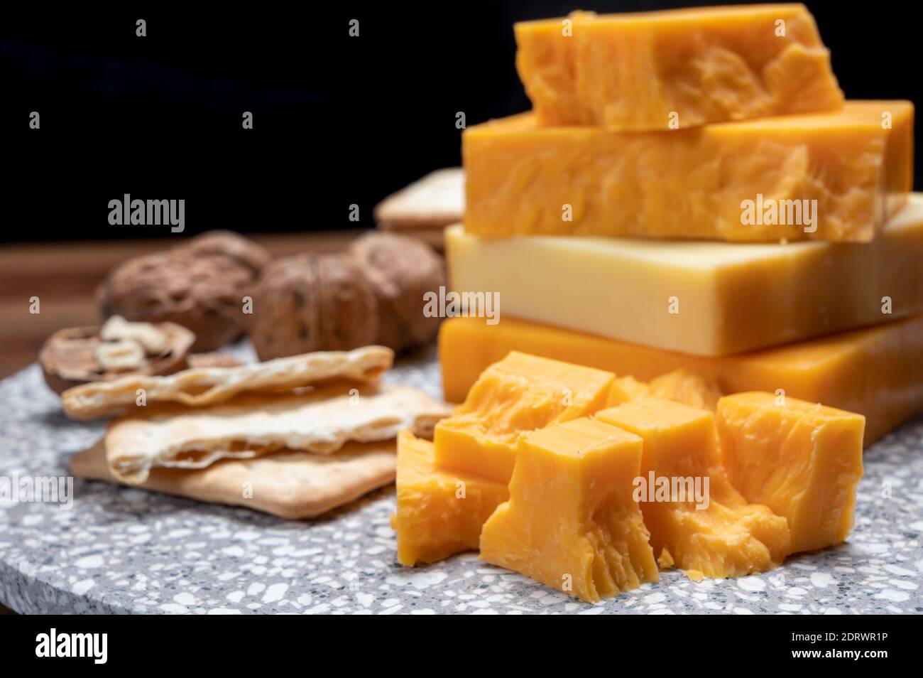 Cheese collection, orange and yellow smoked British cheese from England ...