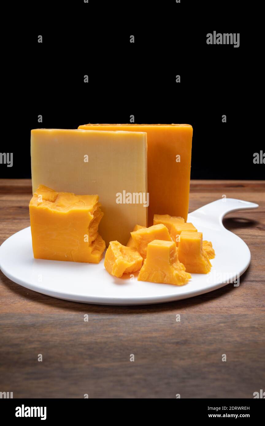 Cheese collection, orange and yellow smoked British cheese from England ...