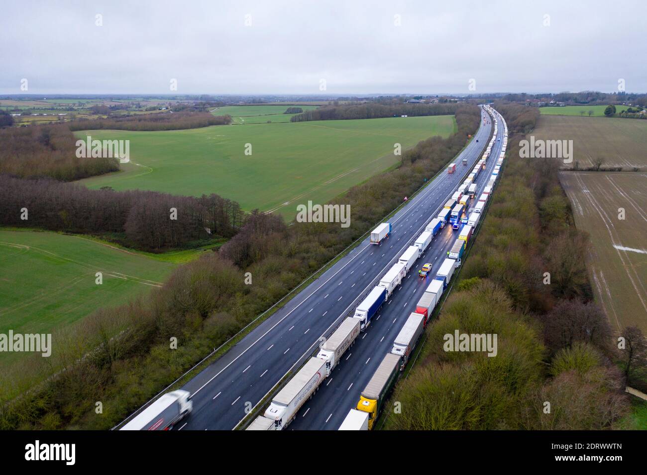 Kent, UK. 21st December 2020. Thousands of lorries line the M20 ...