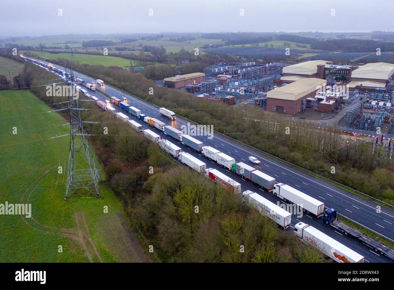 Kent, UK. 21st December 2020. Thousands of lorries line the M20 ...