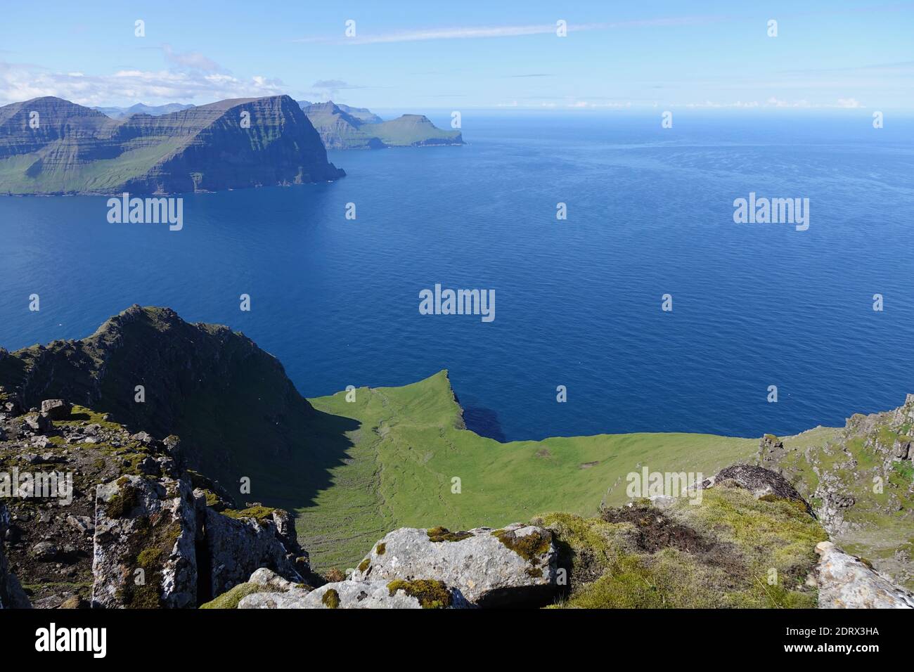 Multiple hills at the fjord Stock Photo - Alamy