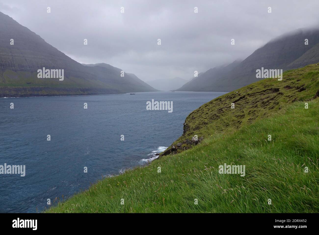 Hike along the fjord in Mule, Faroe Islands Stock Photo - Alamy