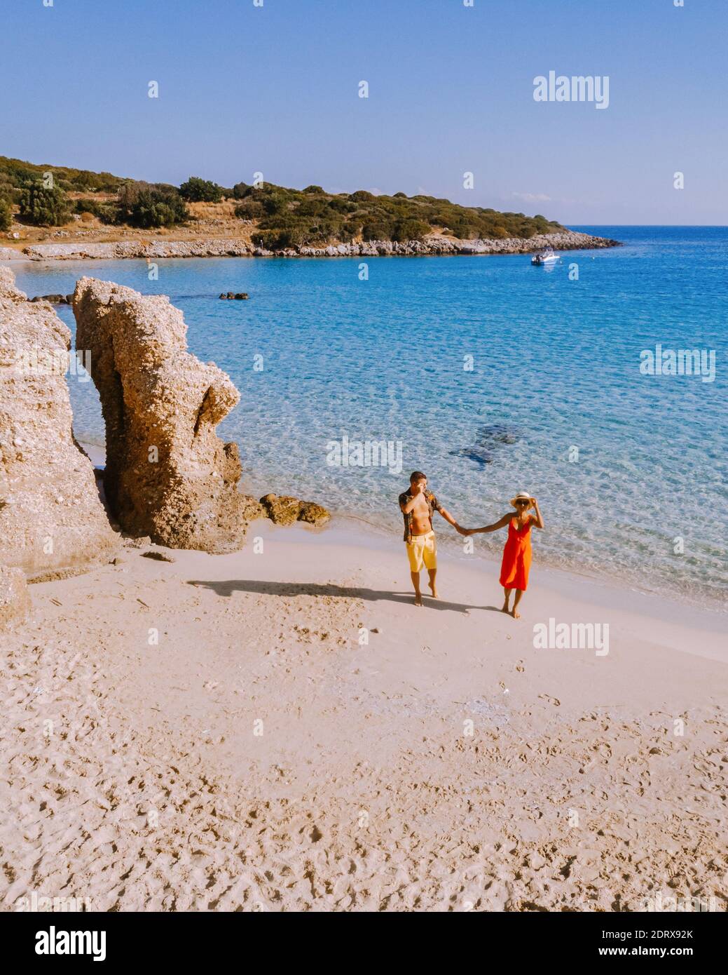 couple men and woman mid age on vacation at the Greek Island Crete ...