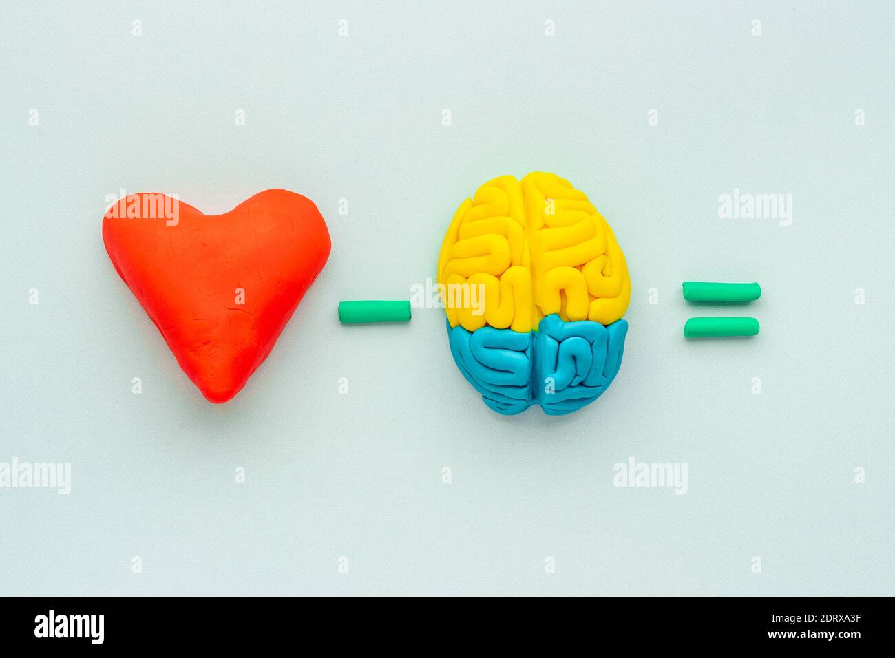 Mind and emotions - brain with heart made of clay, top view Stock Photo ...