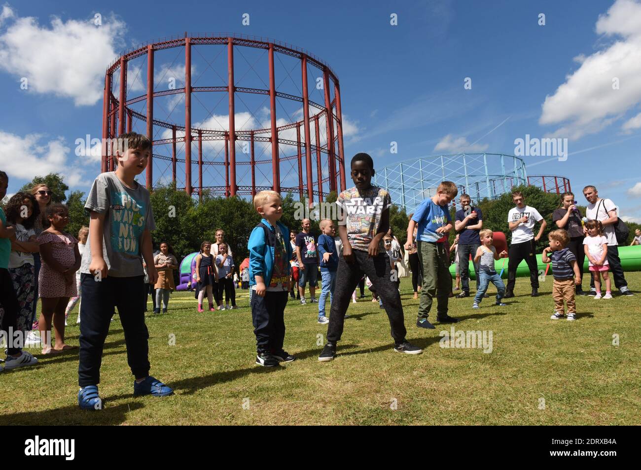 Children playing in the park next to Gasometers at Windsor Street Gas ...