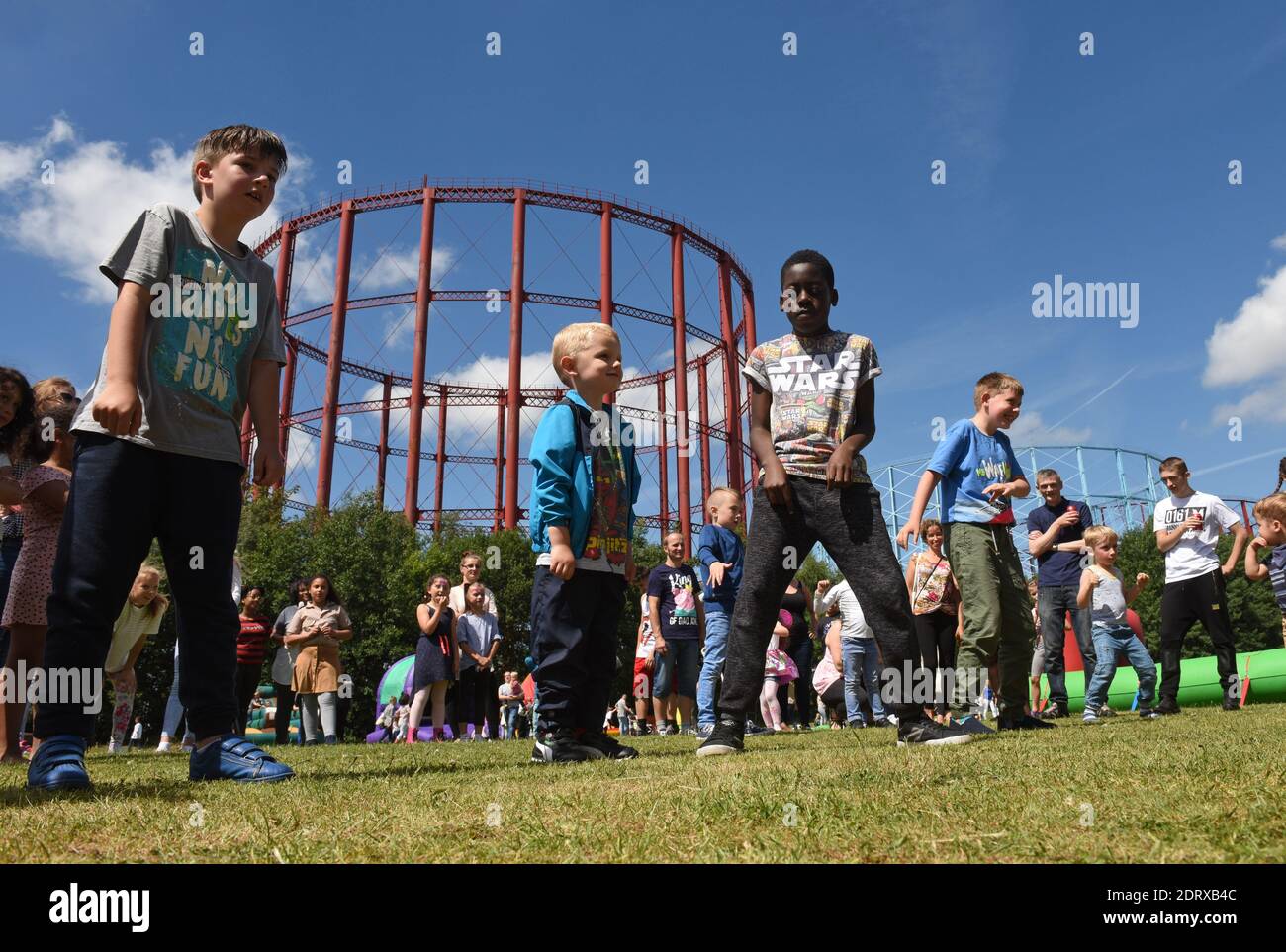Children playing in the park next to Gasometers at Windsor Street Gas ...
