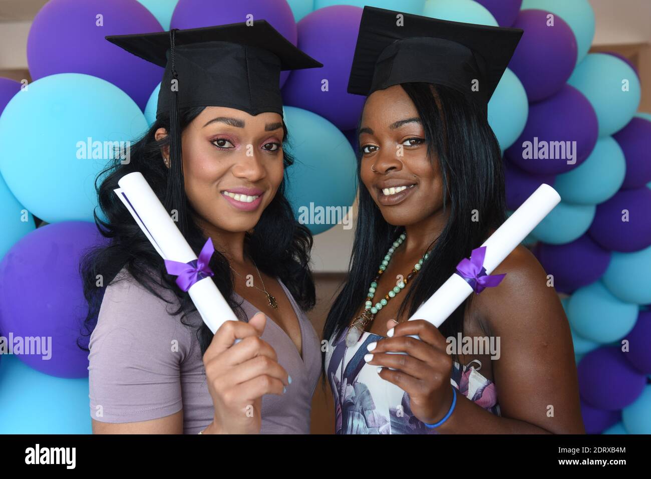 Happy smiling students graduating on graduation day Britain, Uk 2018 ...