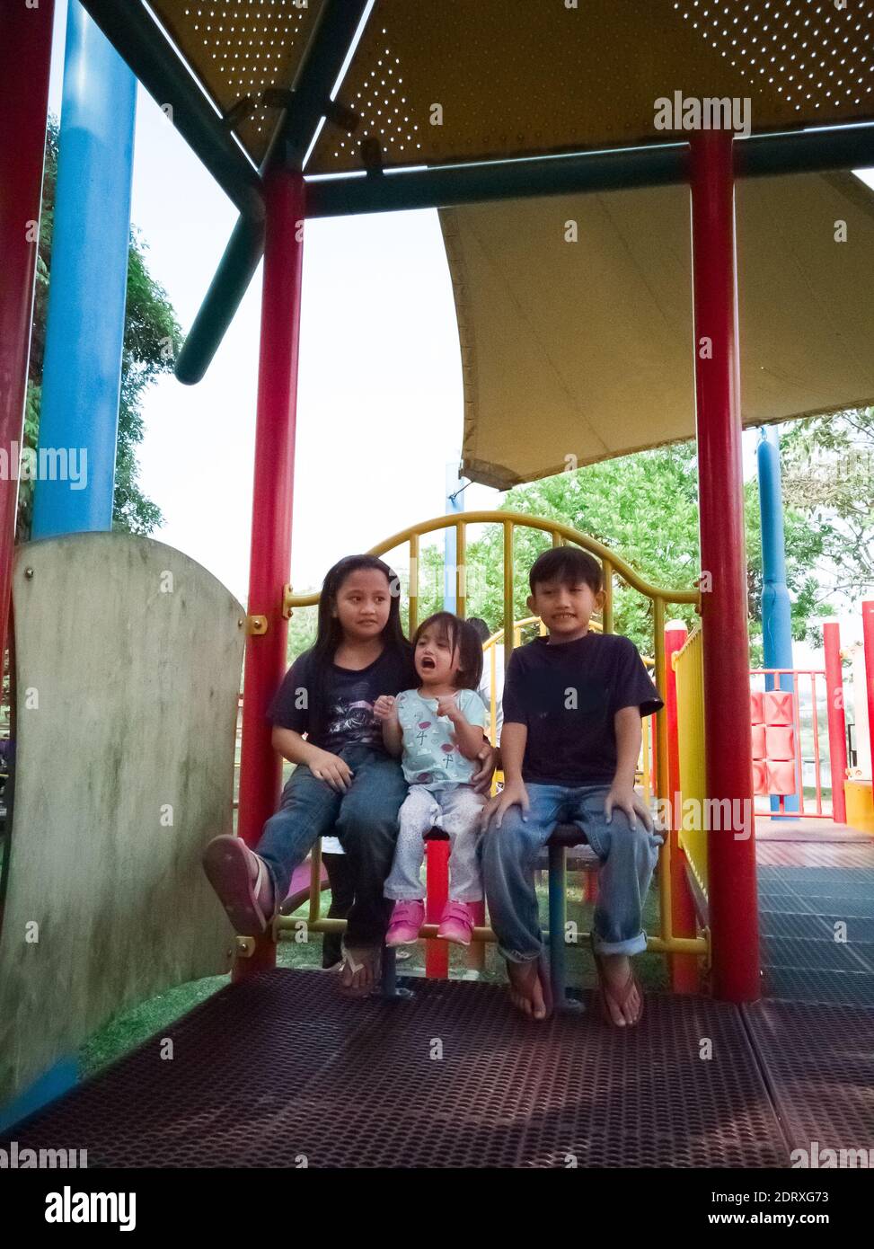 Child climbing on gate hi-res stock photography and images - Alamy