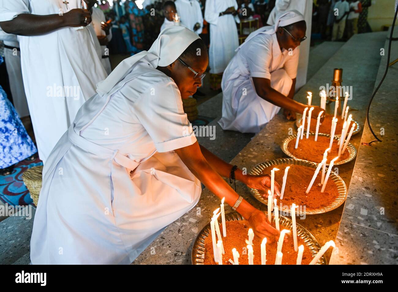 MALI, Bamako, catholic church, holy mass, order sister with candles ...