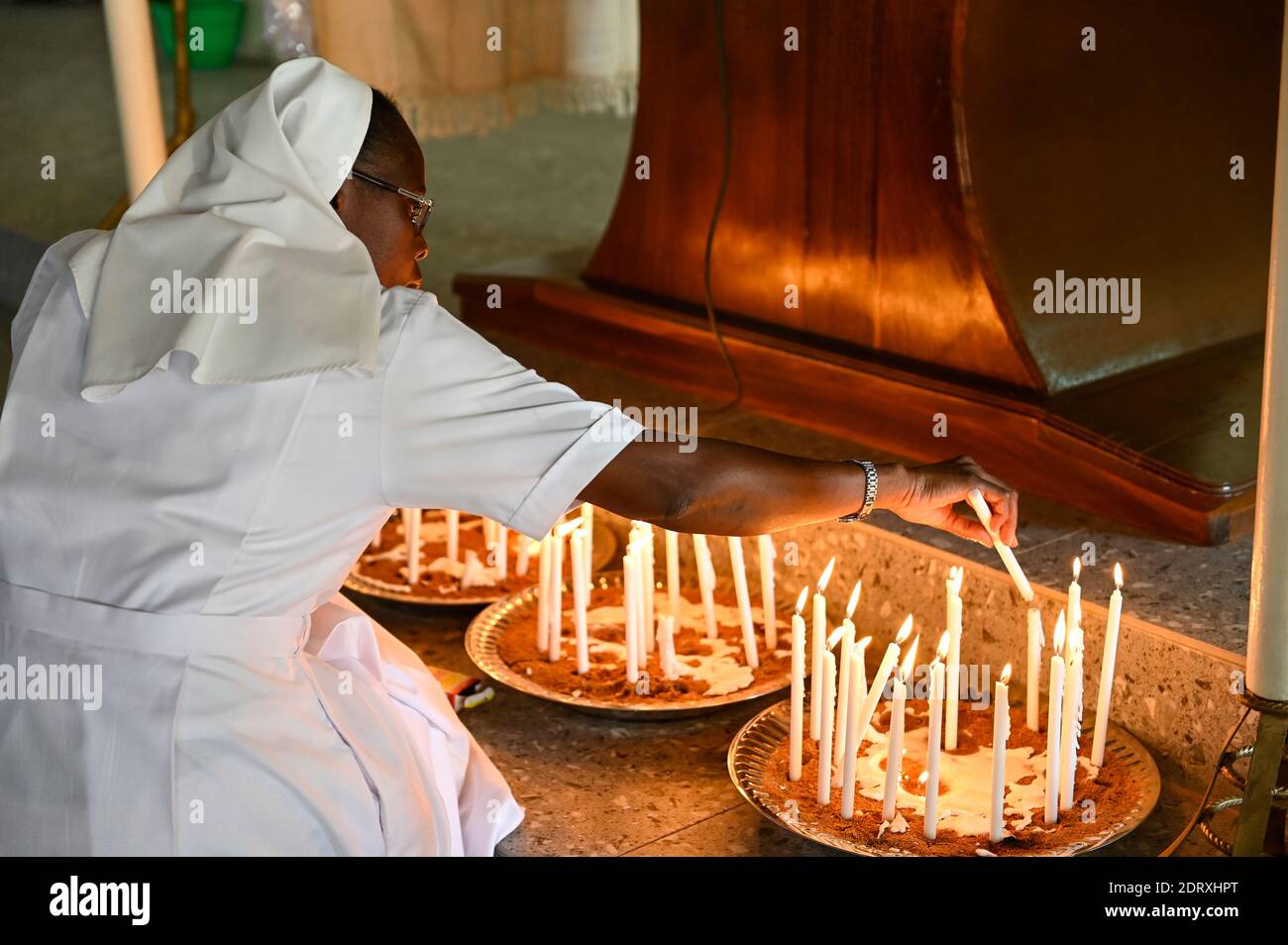 MALI, Bamako, catholic church, holy mass, order sister with candles ...