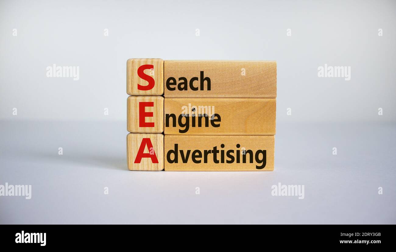 SEA - search engine advertising symbol. Wooden cubes with words 'SEA ...