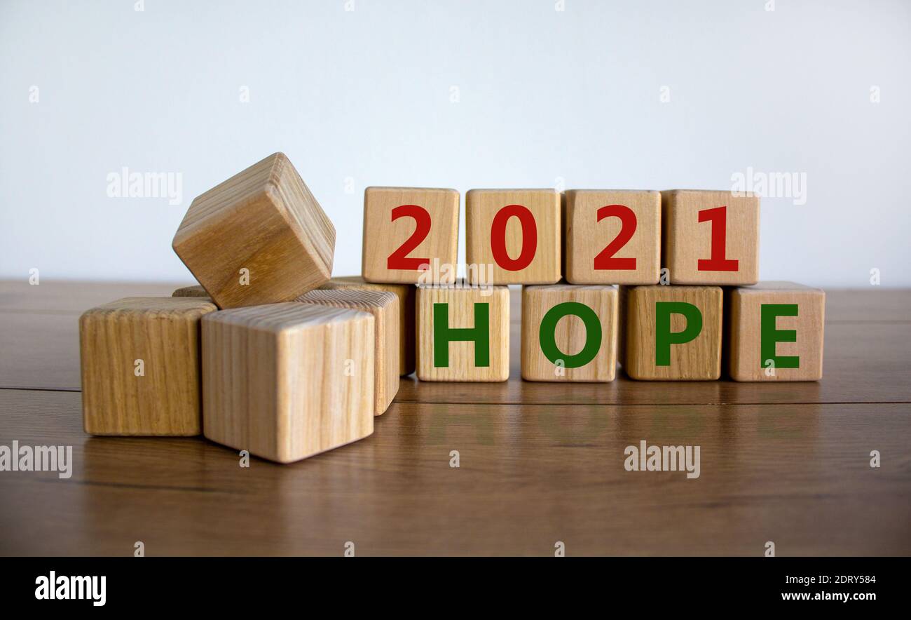 Symbol of planning 2021. Wooden cubes with words 'Hopes 2021 ...