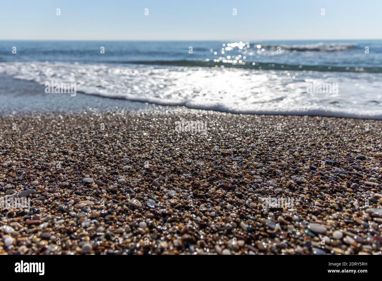 Sparkling waves on the beach hits the pebble beach in Antalya Turkey ...