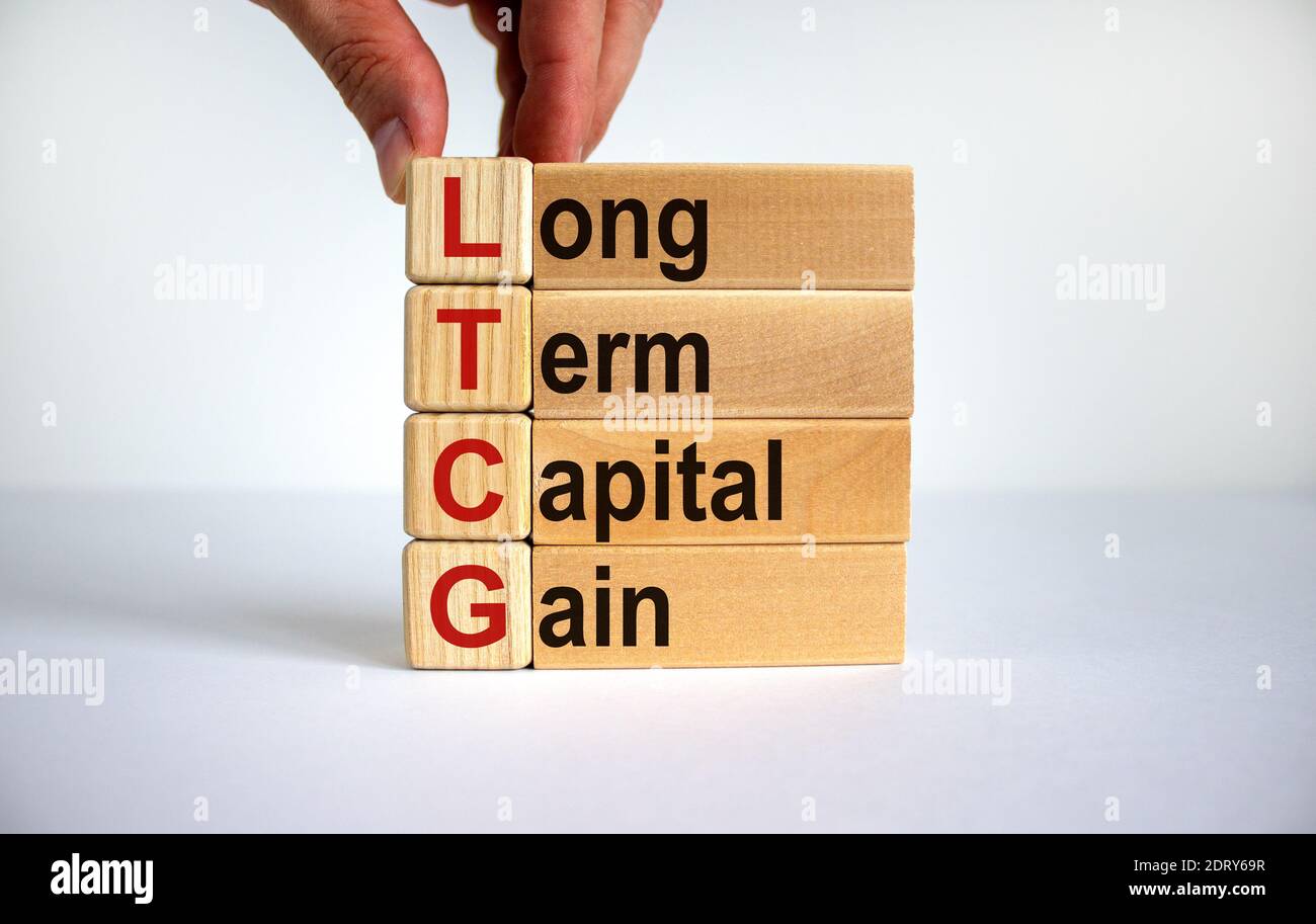 LTCG symbol. Wooden cubes and blocks with words 'LTCG - long term ...