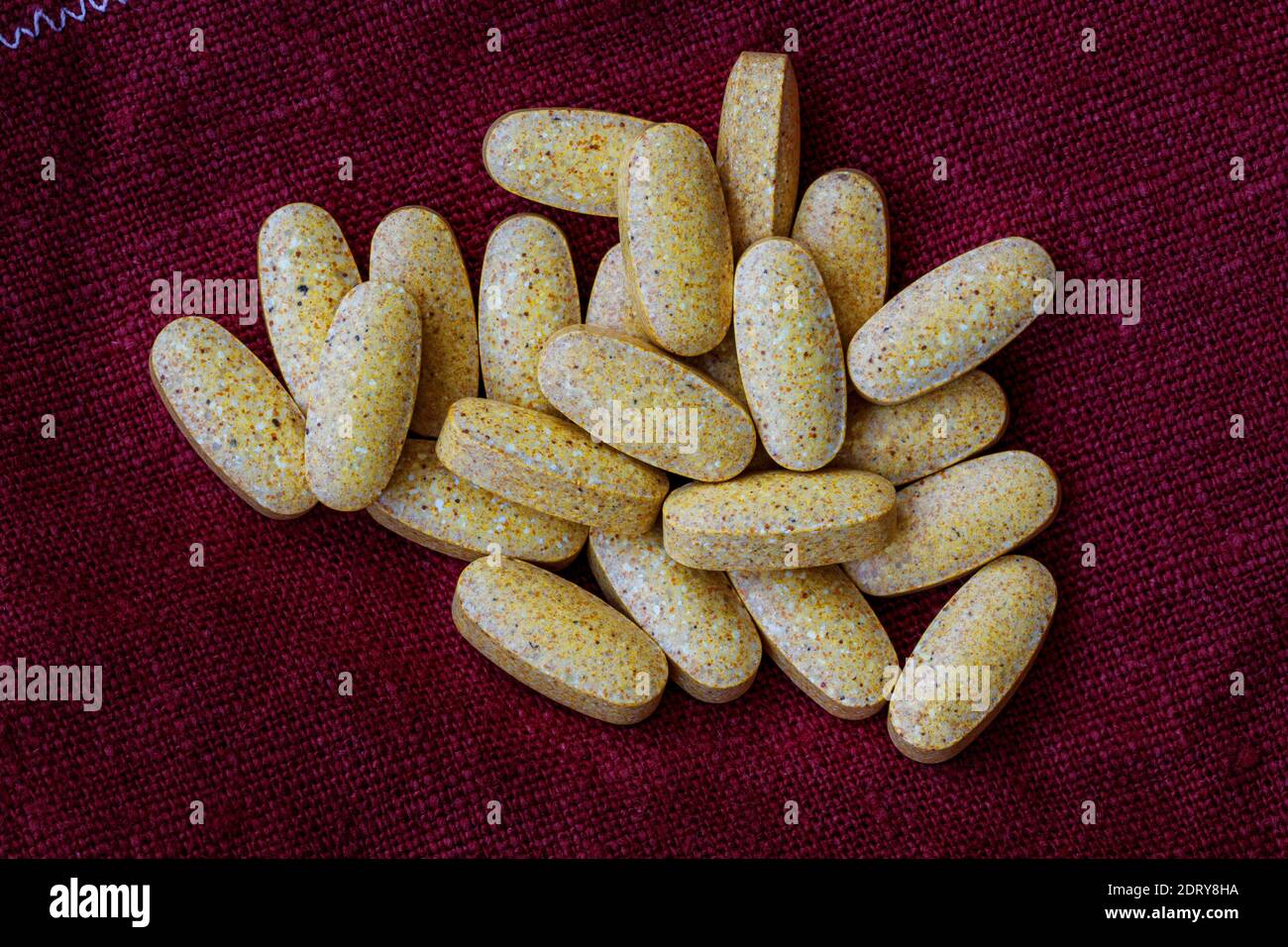 close-up of multivitamin and mineral supplement tablets. dietary ...