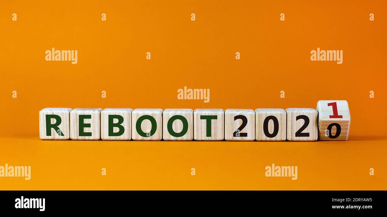 2021 reboot new year symbol. Fliped wooden cube and changed words ...