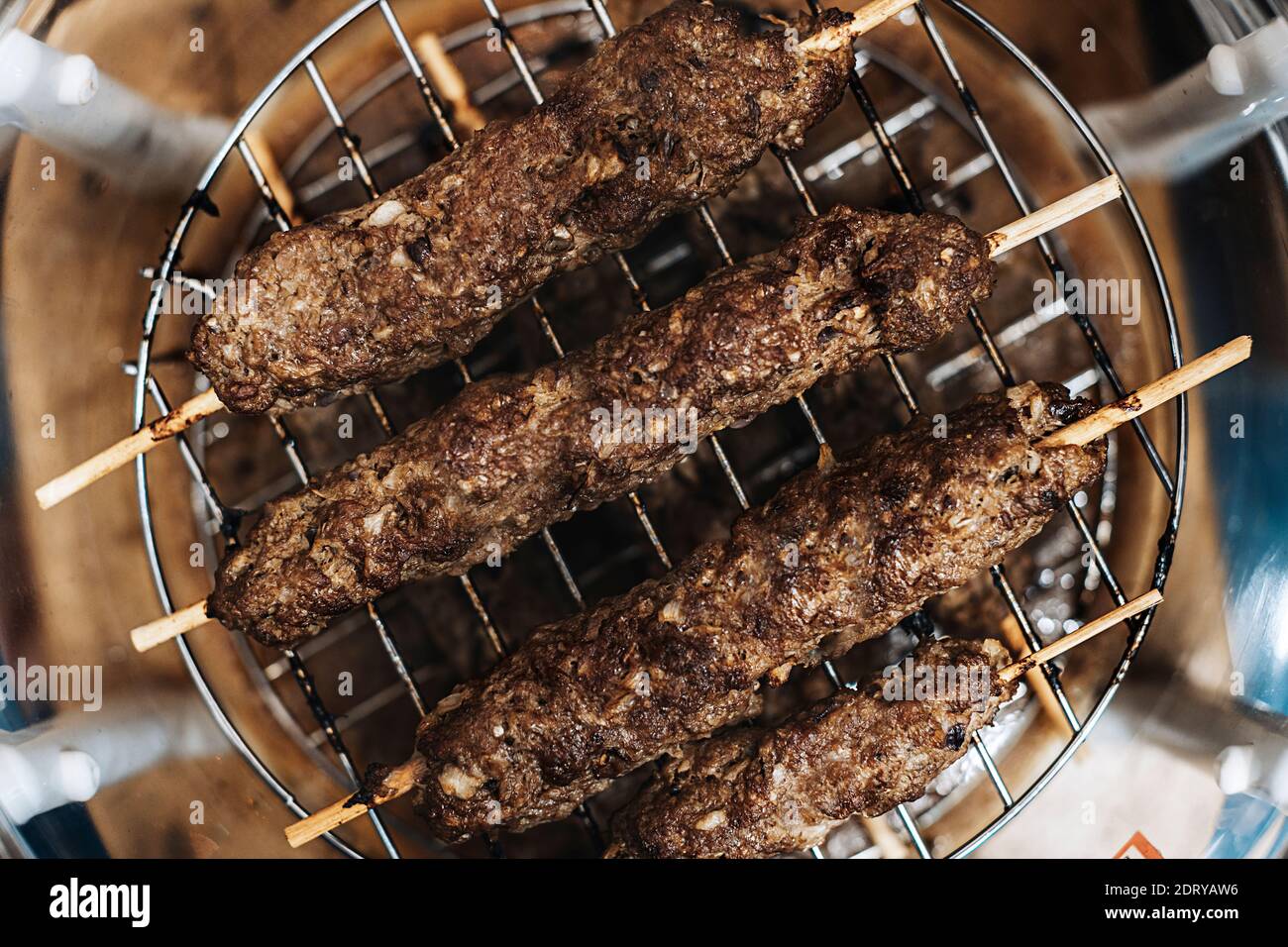 selective focus photo of home grilling. cooking lulia-kebab (minced ...
