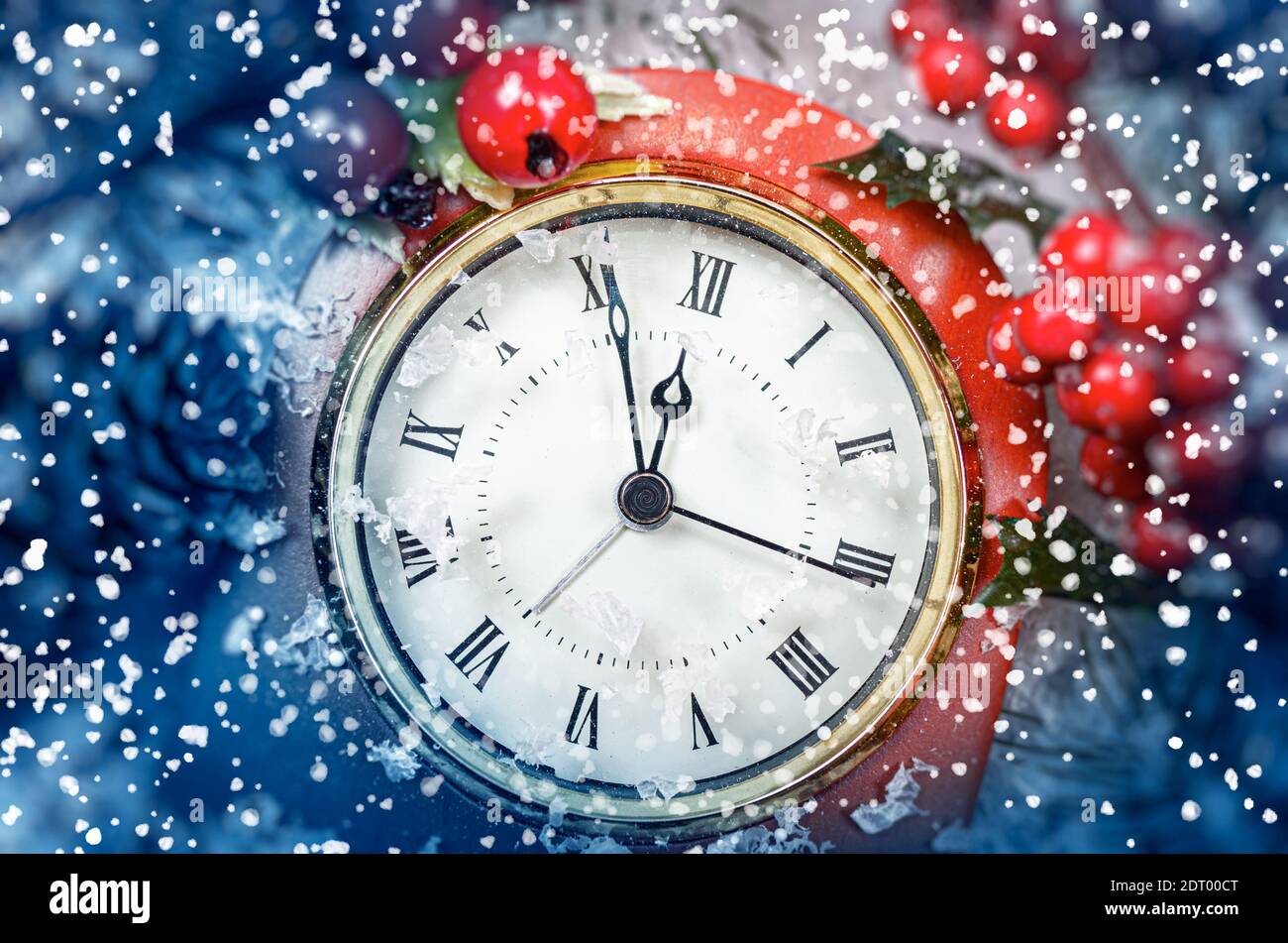 New Year's clock and still life. The clock shows midnight Stock Photo ...