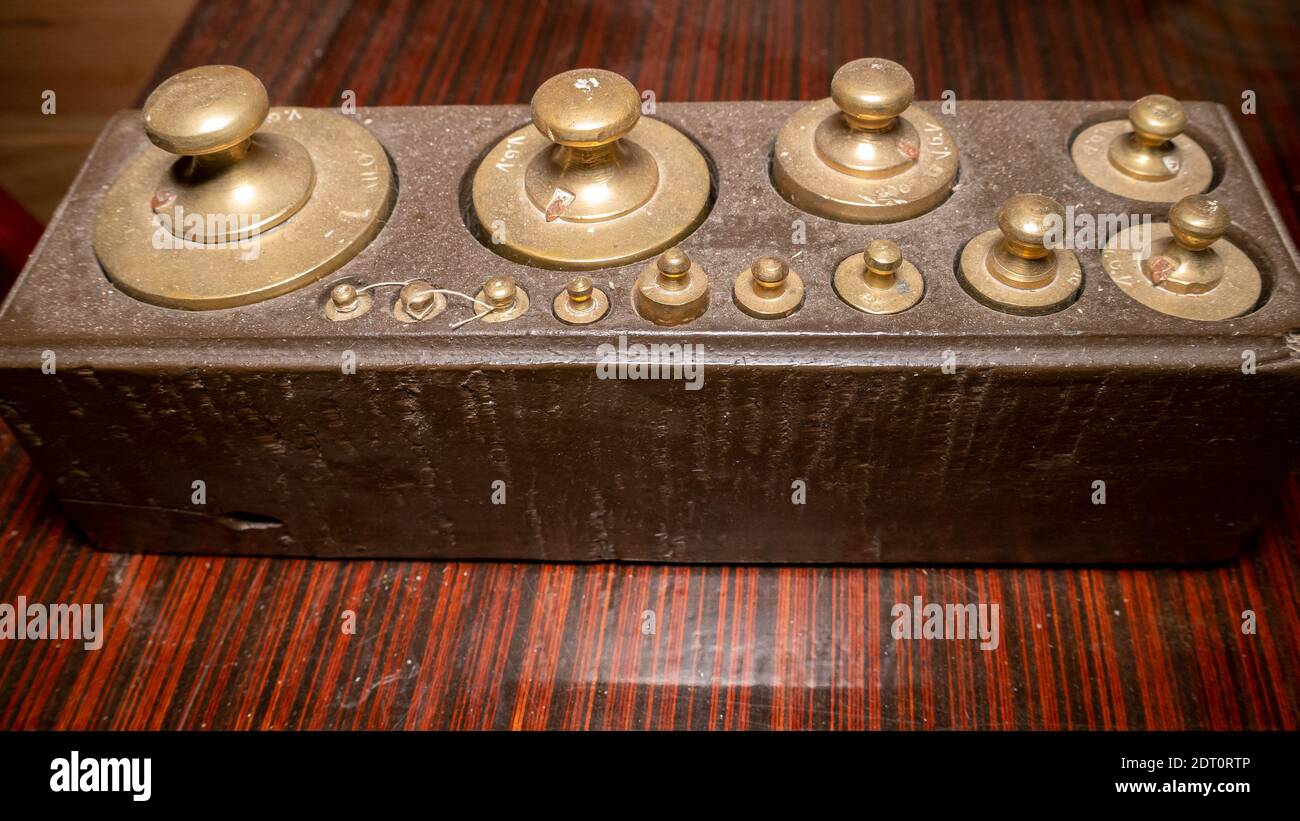 An old set of weights of different sizes Stock Photo - Alamy
