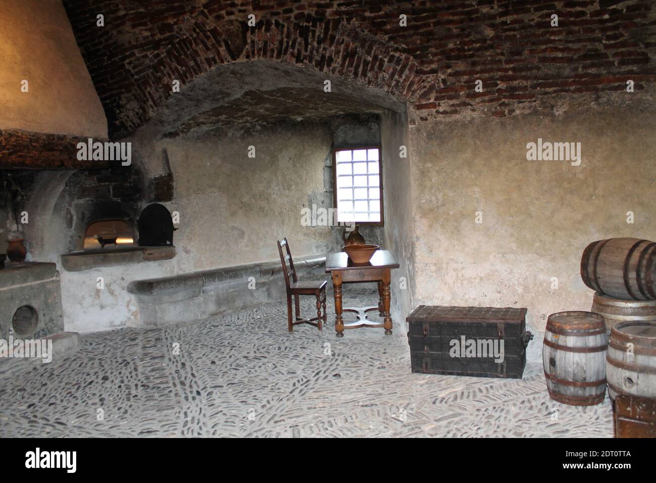 Ancient chest and wine barrels. A room in the castle Stock Photo - Alamy