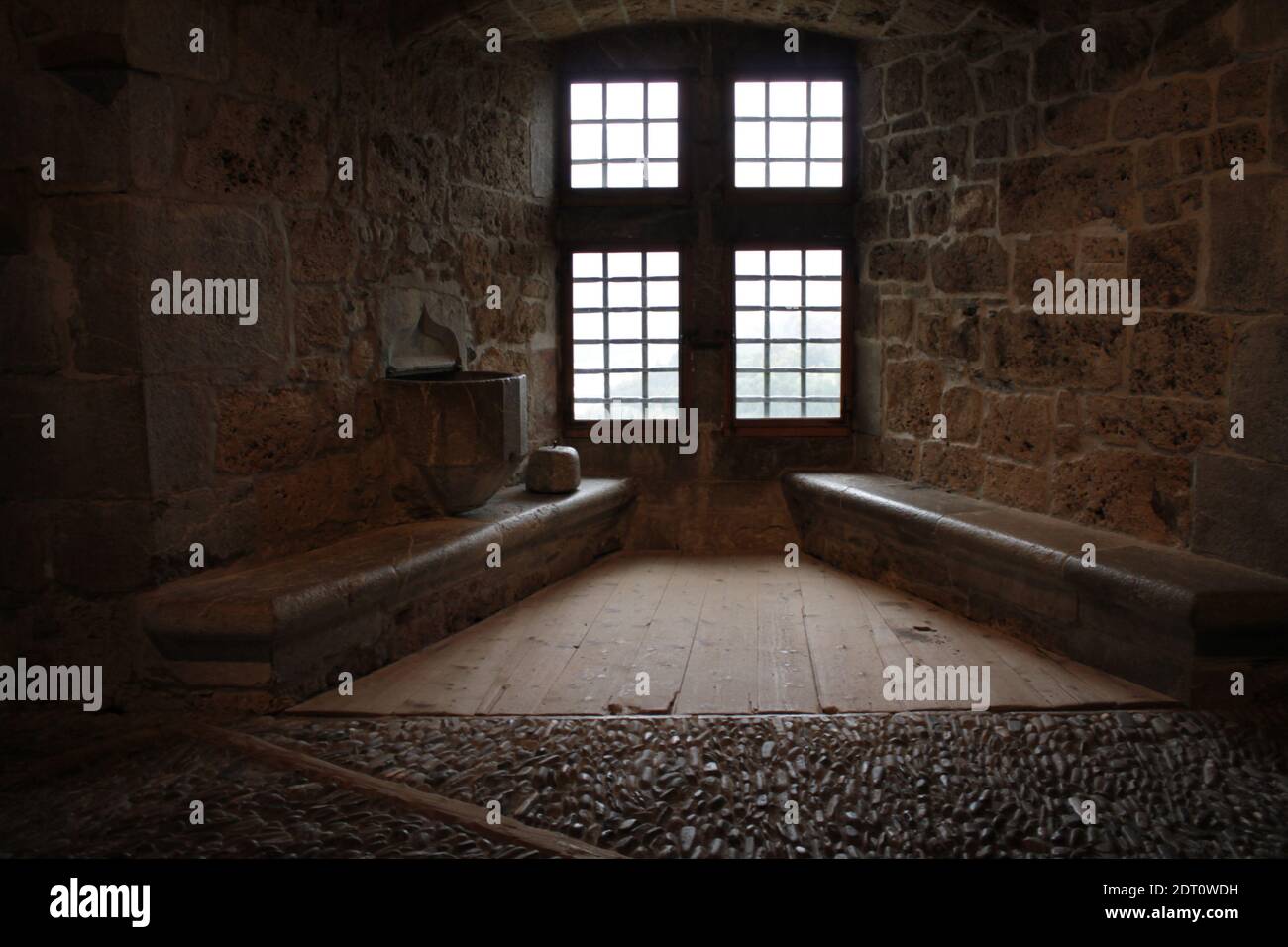 Observation deck in the fortress. Large window and stone seat Stock ...