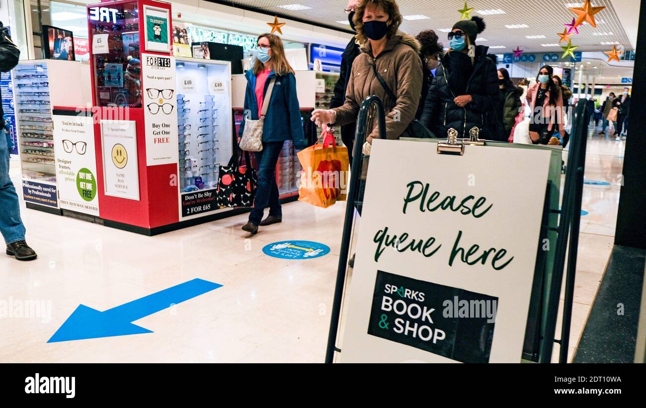 Crowd Of Shoppers Wearing Protective Face Masks Shopping During COVID ...