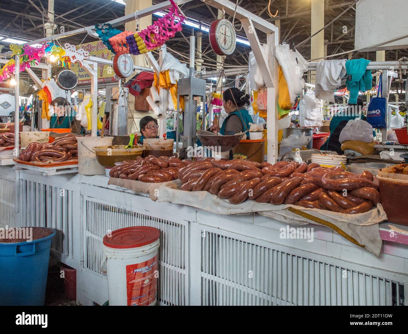Cusco, Peru - May 19, 2016: Woman is selling meat on the bazaar in ...